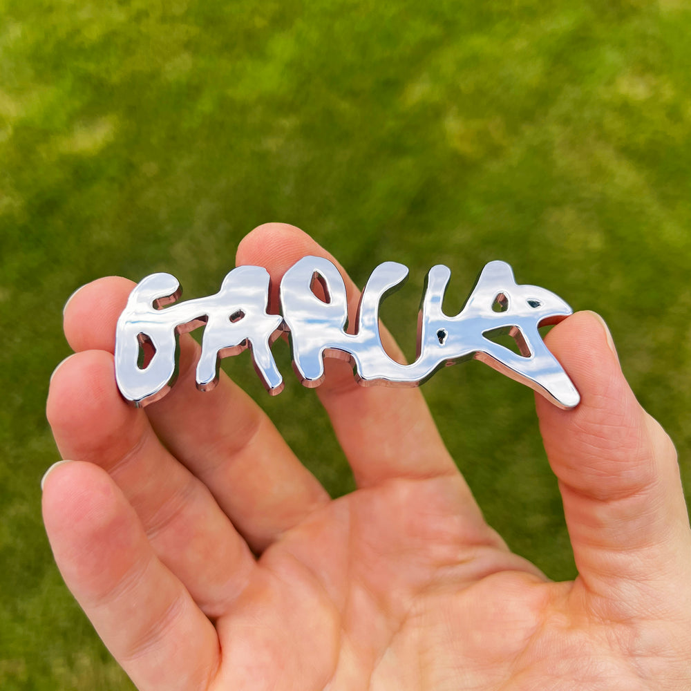 the GARCIA SIGNATURE Chrome Car Badge | Grateful Fred