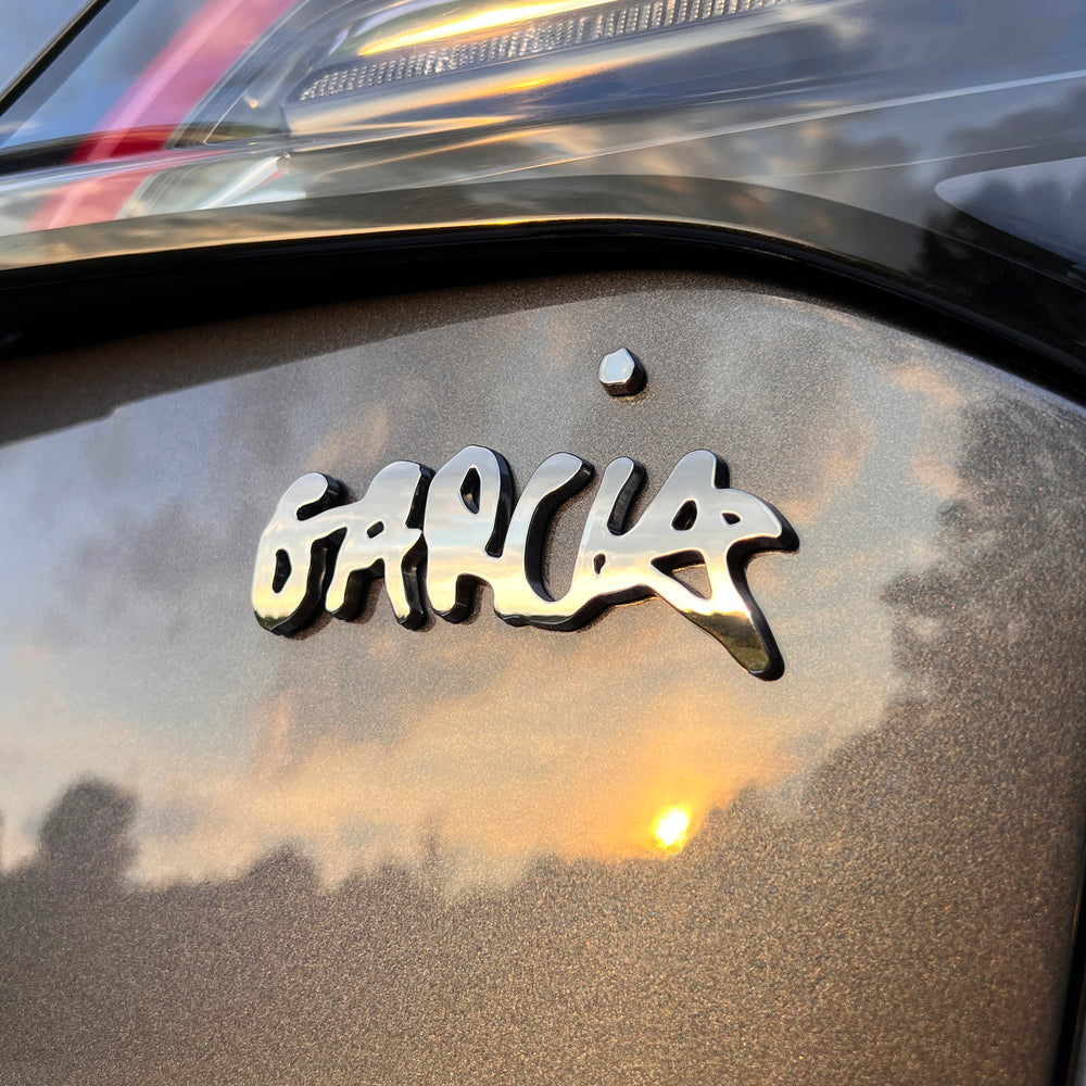 the GARCIA SIGNATURE Chrome Car Badge | Grateful Fred