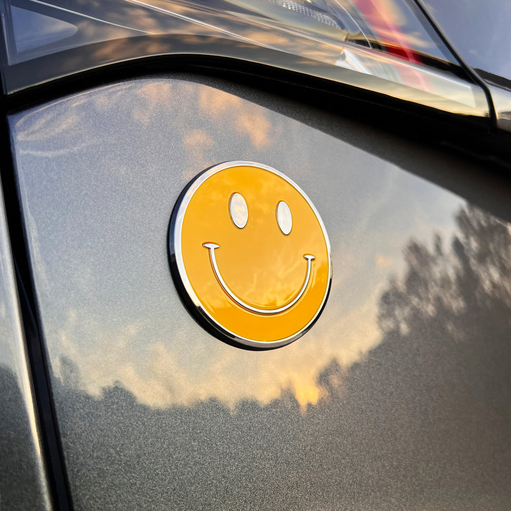 the SMILEY FACE BADGE